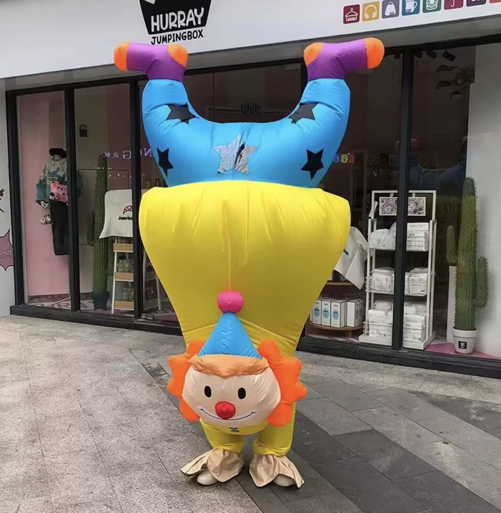 Inflatable costume - Jester (Clown) mascot clown with fan | Cool Mania